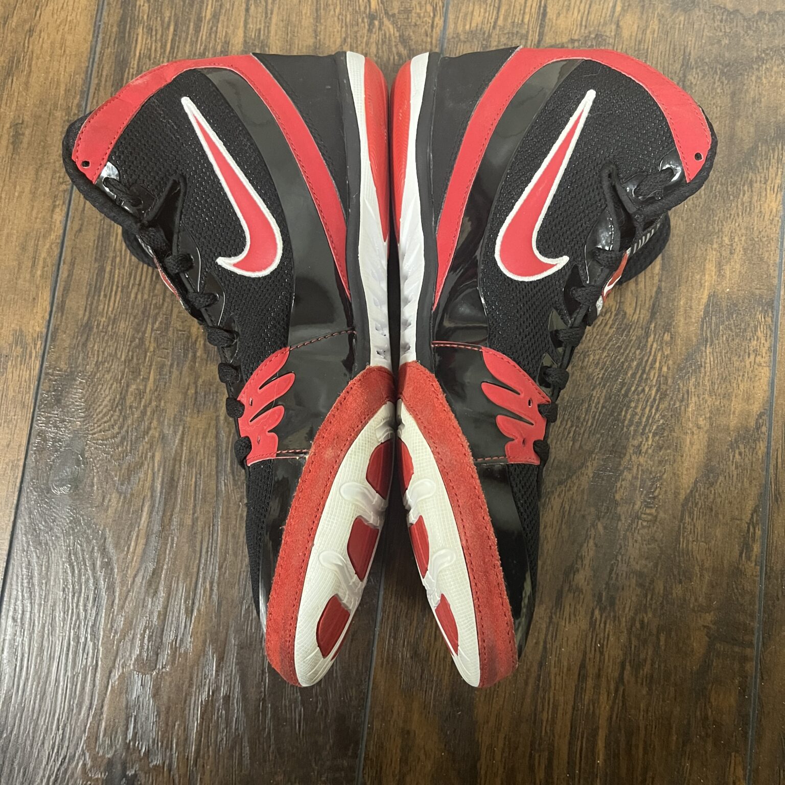 Red, Black, and White Nike Freeks Wrestling Shoes